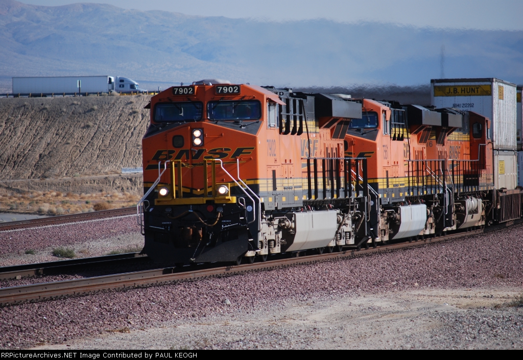 BNSF 7902 with BNSF 7561 behind her roll westbound.